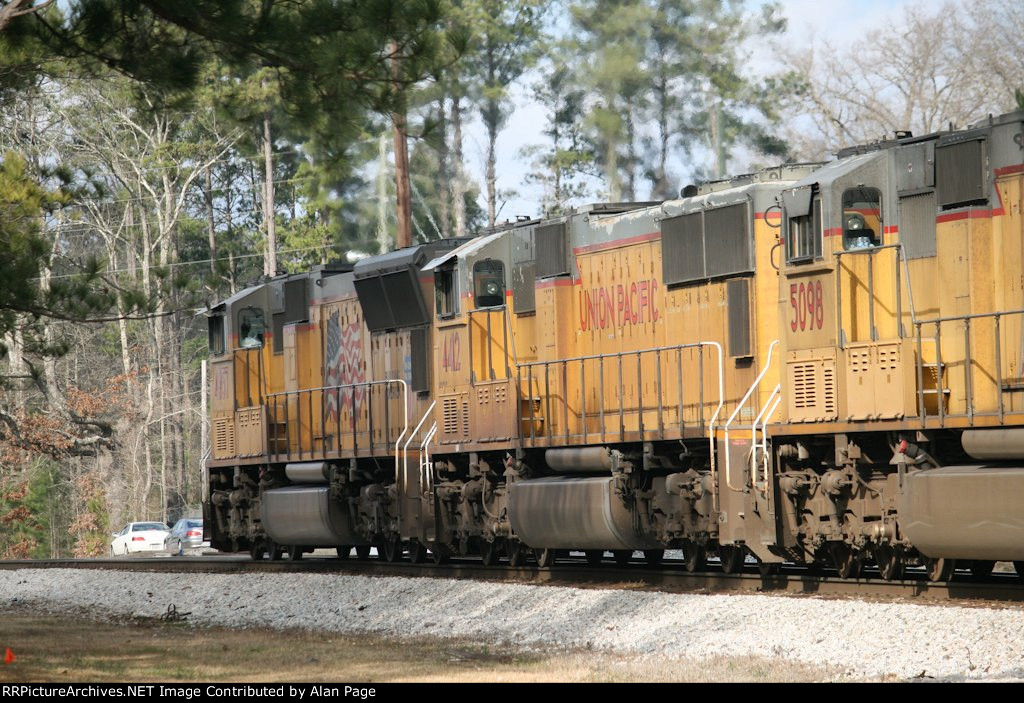 UP SD70Ms 4957, 4412, an` 5098 head east past the Dodson Road signals